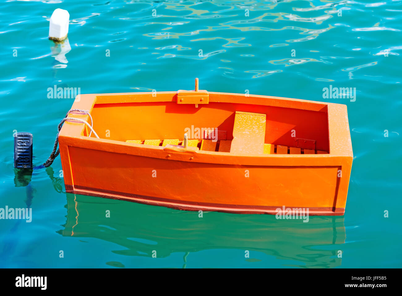 Tiny Red dingy Stock Photo - Alamy