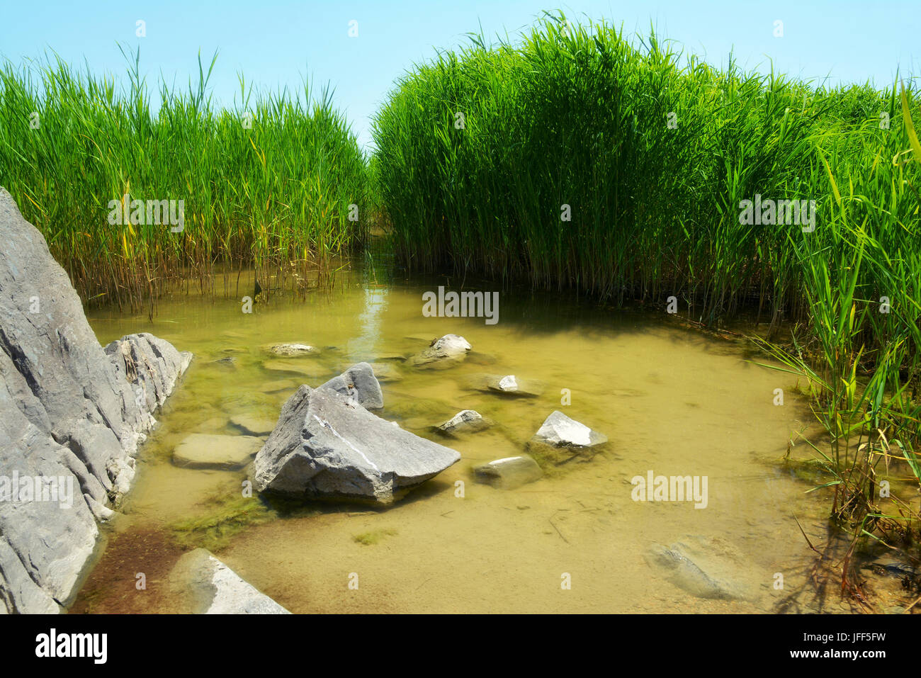 Shore of Lake Sinoe where is standing the ancient ruins of the city of ...