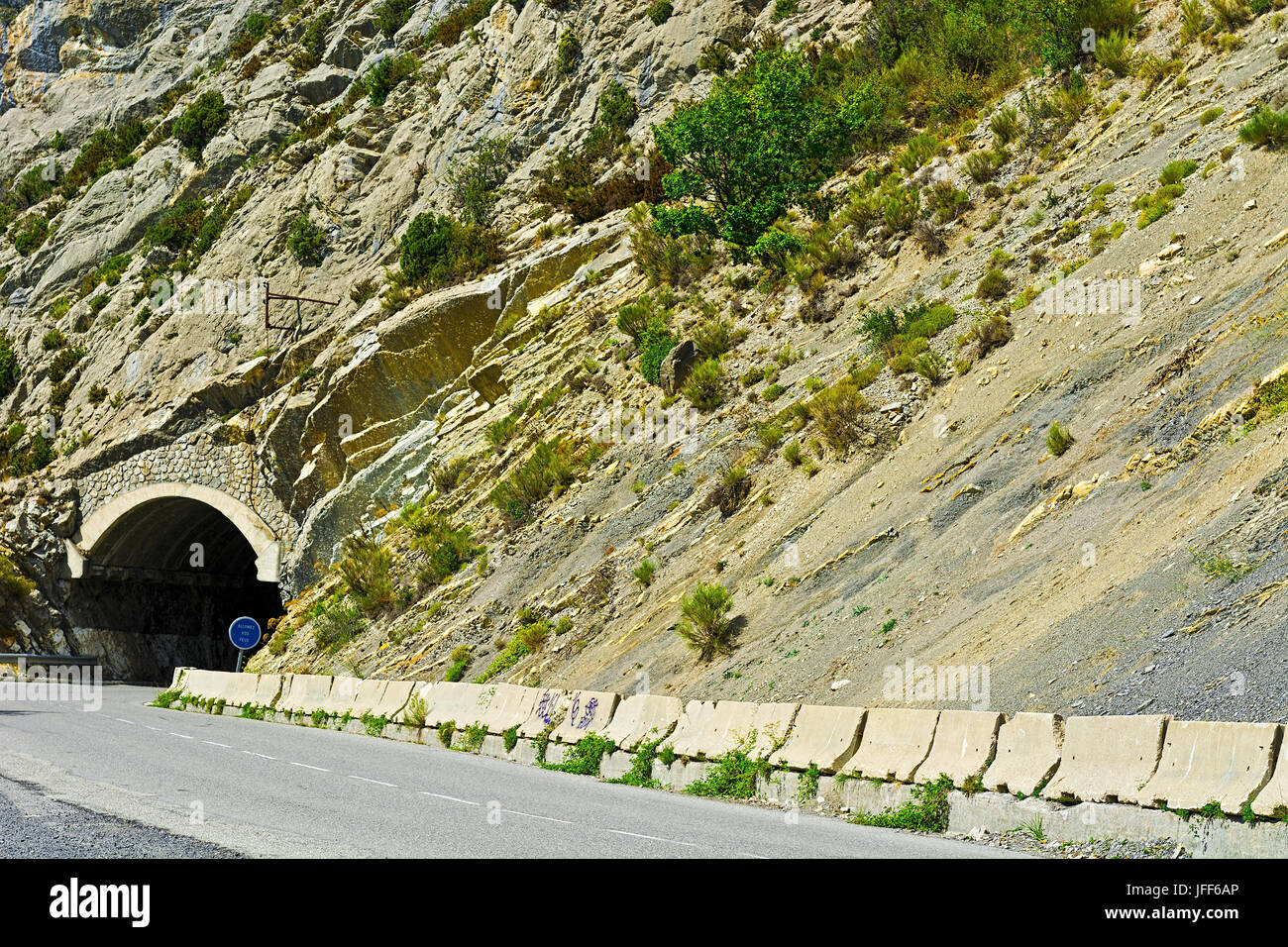 Tunnel in the Rock Stock Photo - Alamy