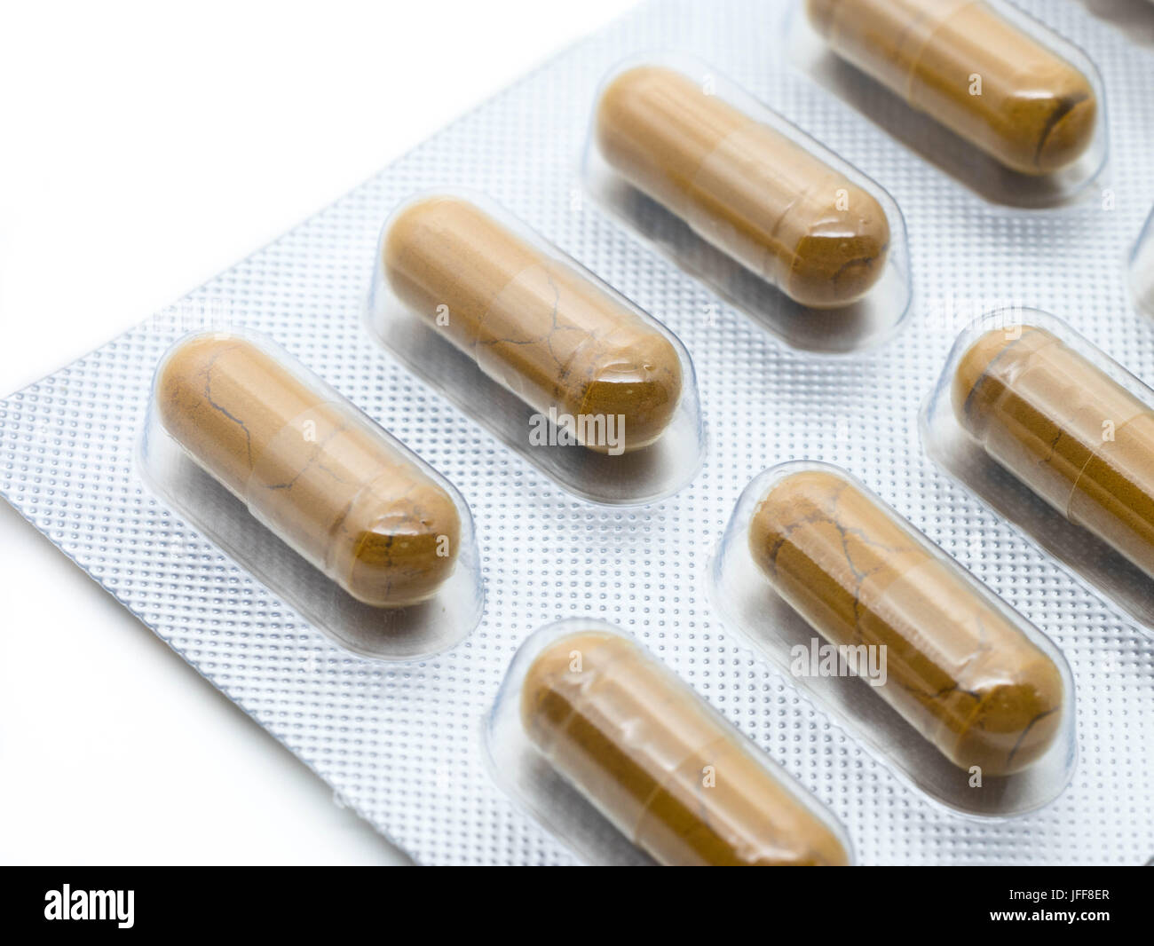 Yellow capsule pills hi-res stock photography and images - Alamy