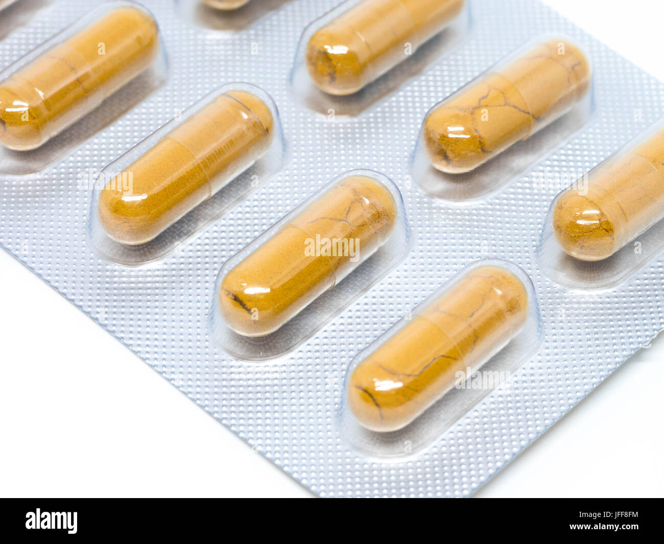 Yellow capsule pills hi-res stock photography and images - Alamy