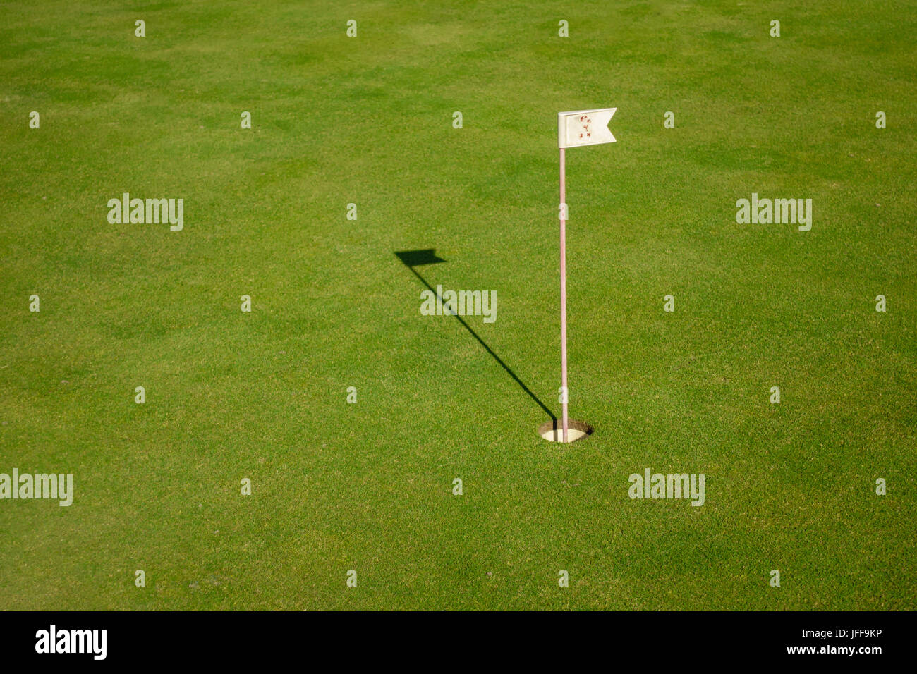 Shadow of golf flag hi-res stock photography and images - Alamy