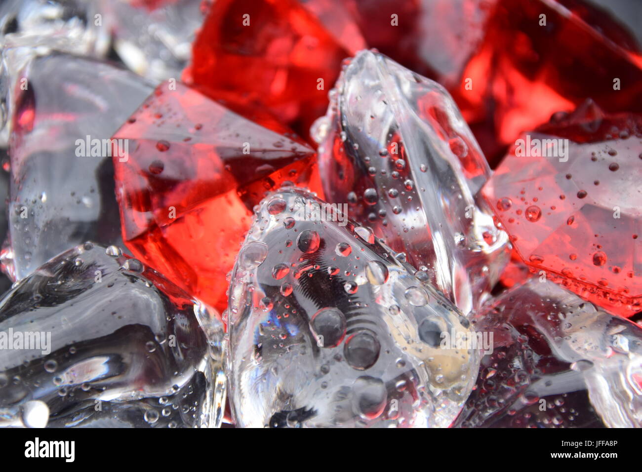 transparent and red gems with droplets Stock Photo - Alamy