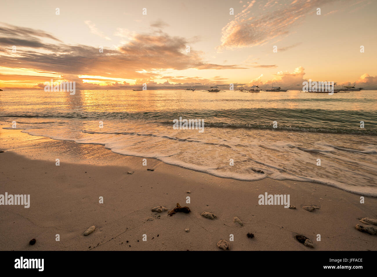 Tropical beach sunset at Philippines Stock Photo - Alamy