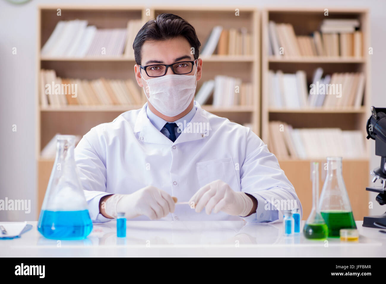 Doctor working in the lab Stock Photo - Alamy