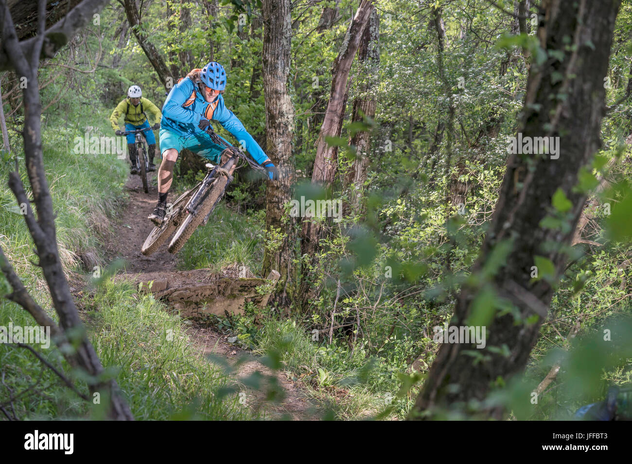 Biker jump over people hi-res stock photography and images - Alamy