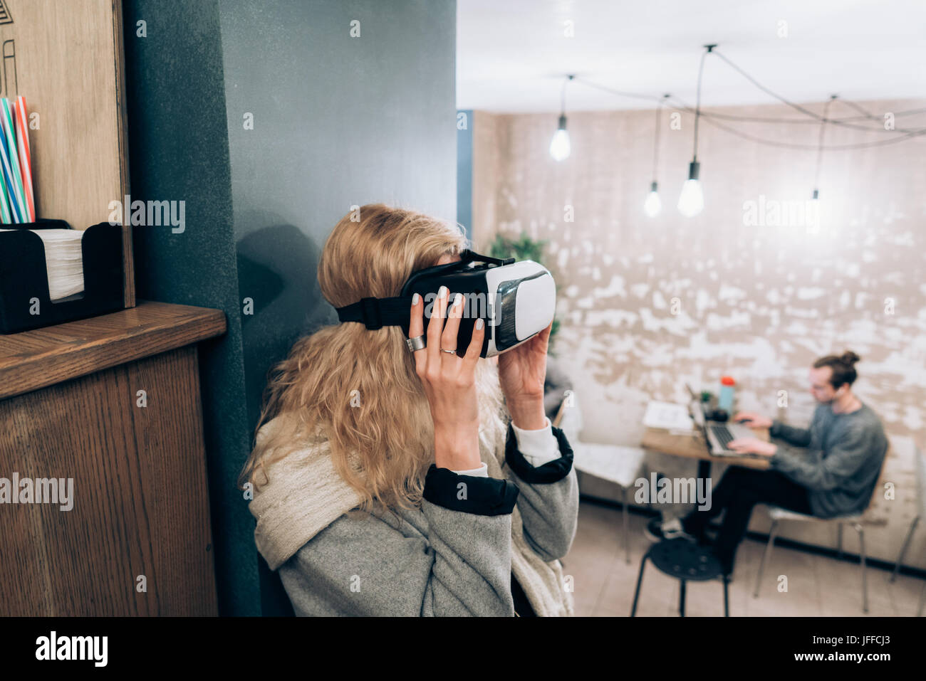 Young girl getting experience VR headset Stock Photo - Alamy