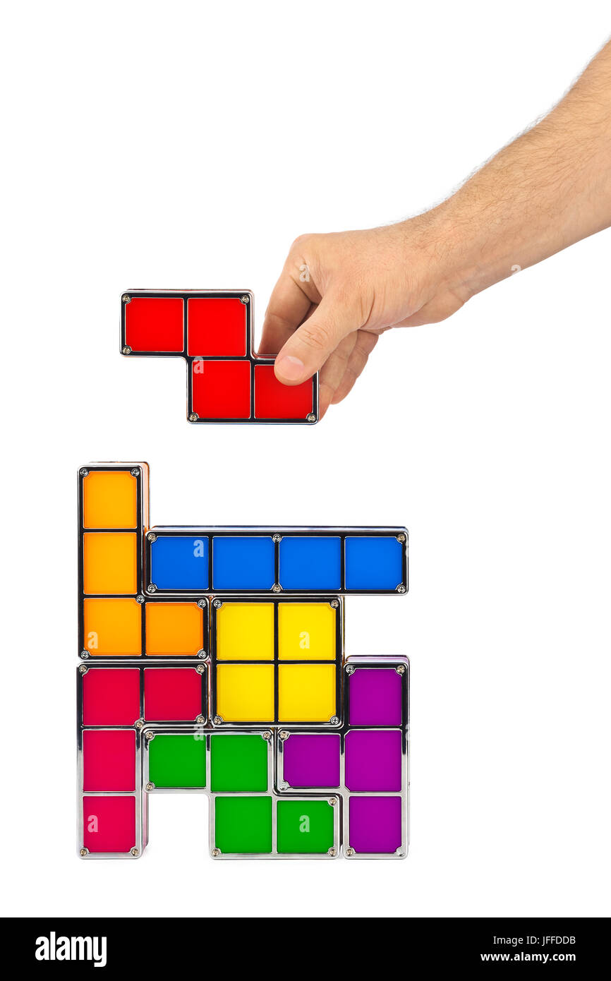 Hand with tetris toy blocks Stock Photo - Alamy