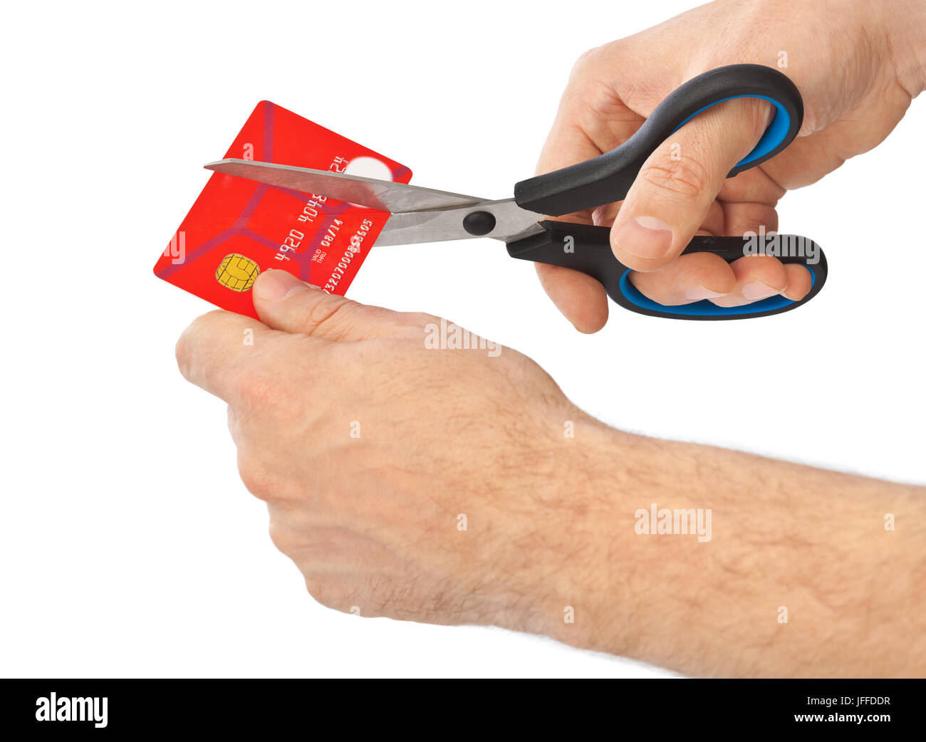 Scissors cutting old credit card Stock Photo - Alamy