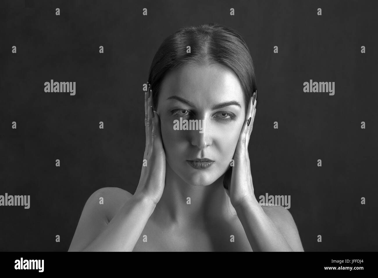 Cover ears hi-res stock photography and images - Alamy