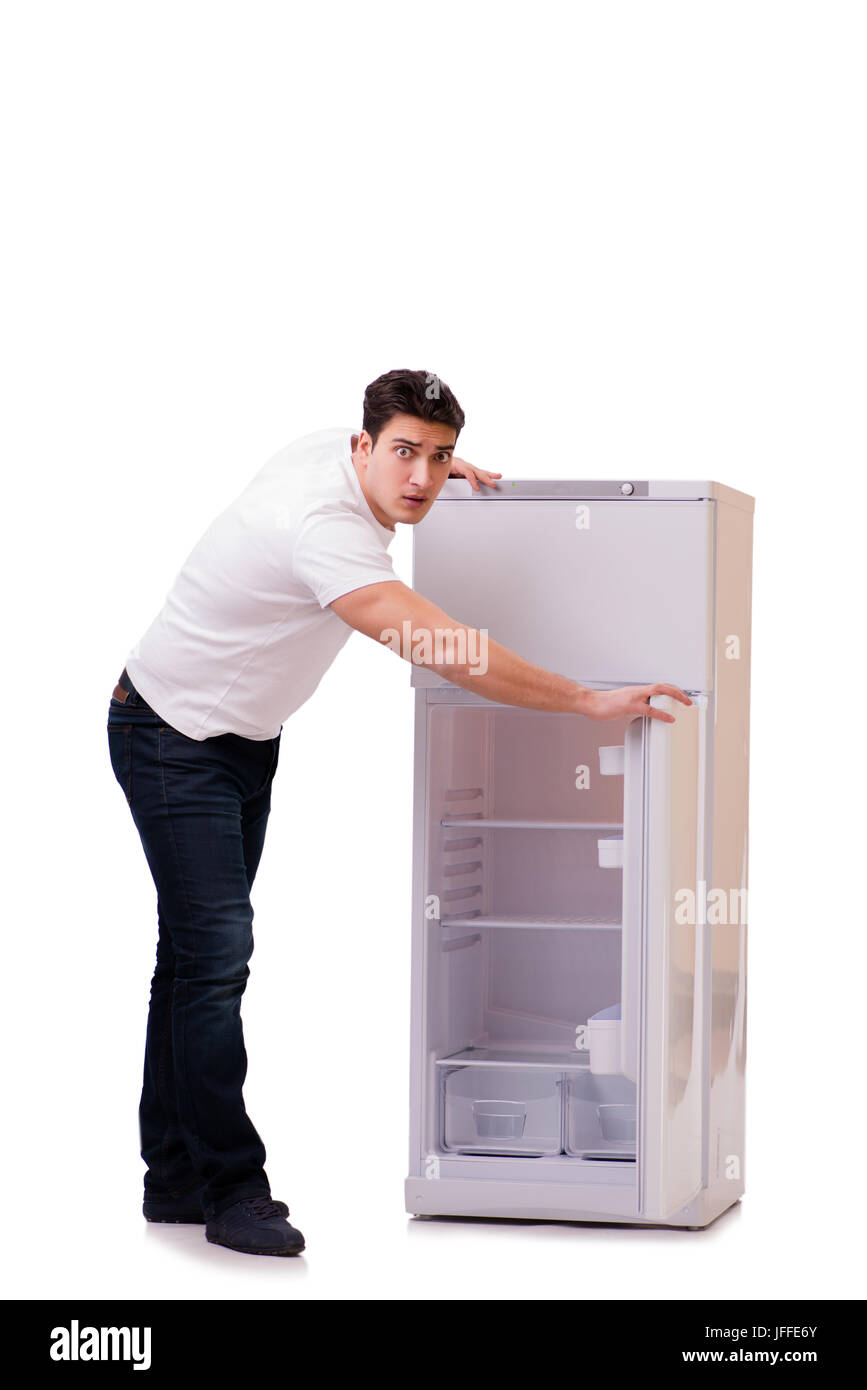 Man looking for food in empty fridge Stock Photo - Alamy