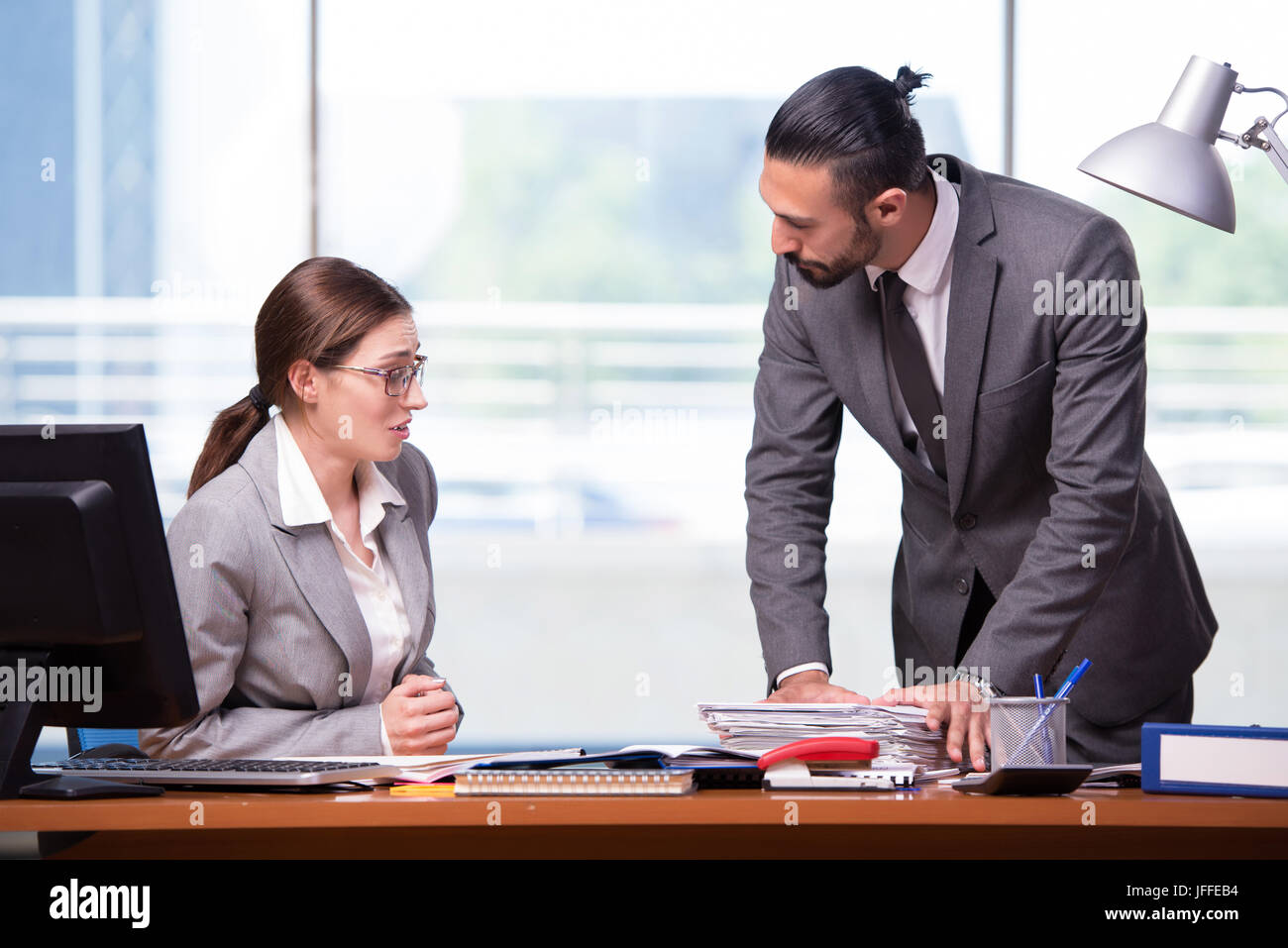 Female secretary explaining boss in hi-res stock photography and images ...