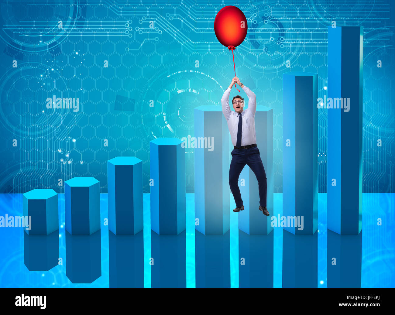 Businessman flying on hot balloon over graph Stock Photo - Alamy