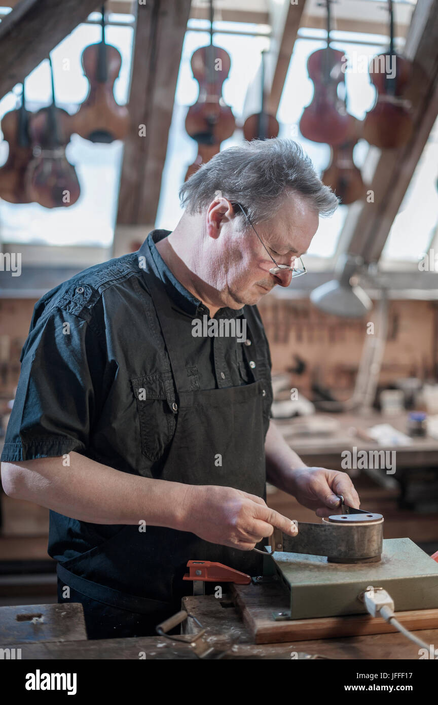 Craftsman working at workshop Stock Photo - Alamy