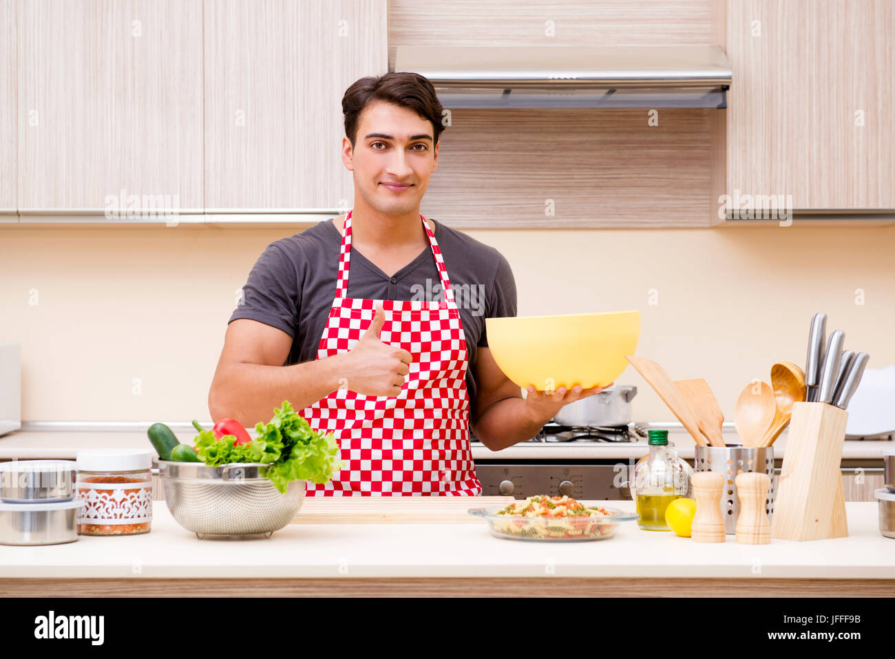 Man male cook preparing food in kitchen Stock Photo - Alamy