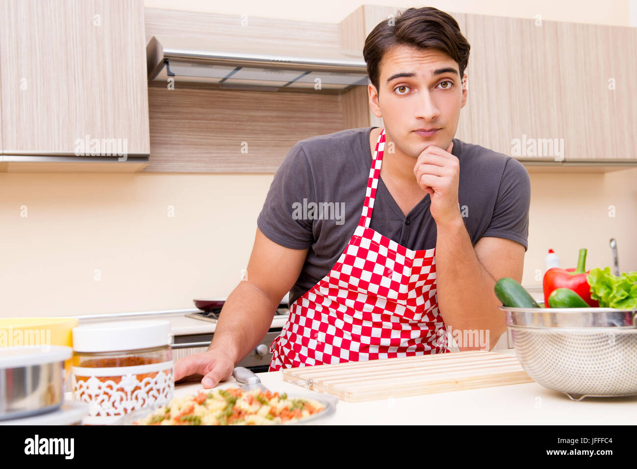 Man male cook preparing food in kitchen Stock Photo - Alamy