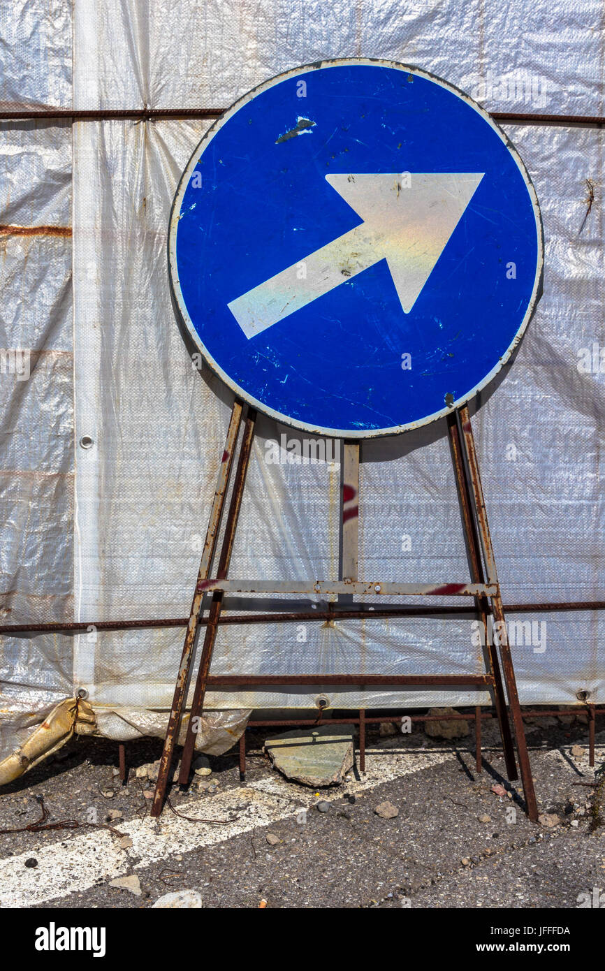 Mandatory direction sign Stock Photo - Alamy