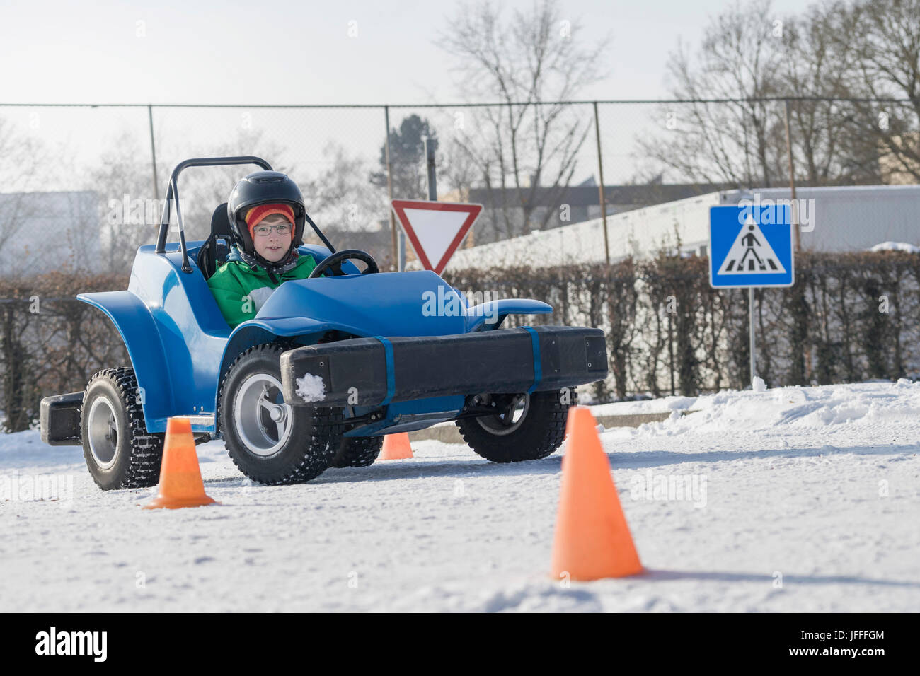 Boy on electric car hi-res stock photography and images - Alamy