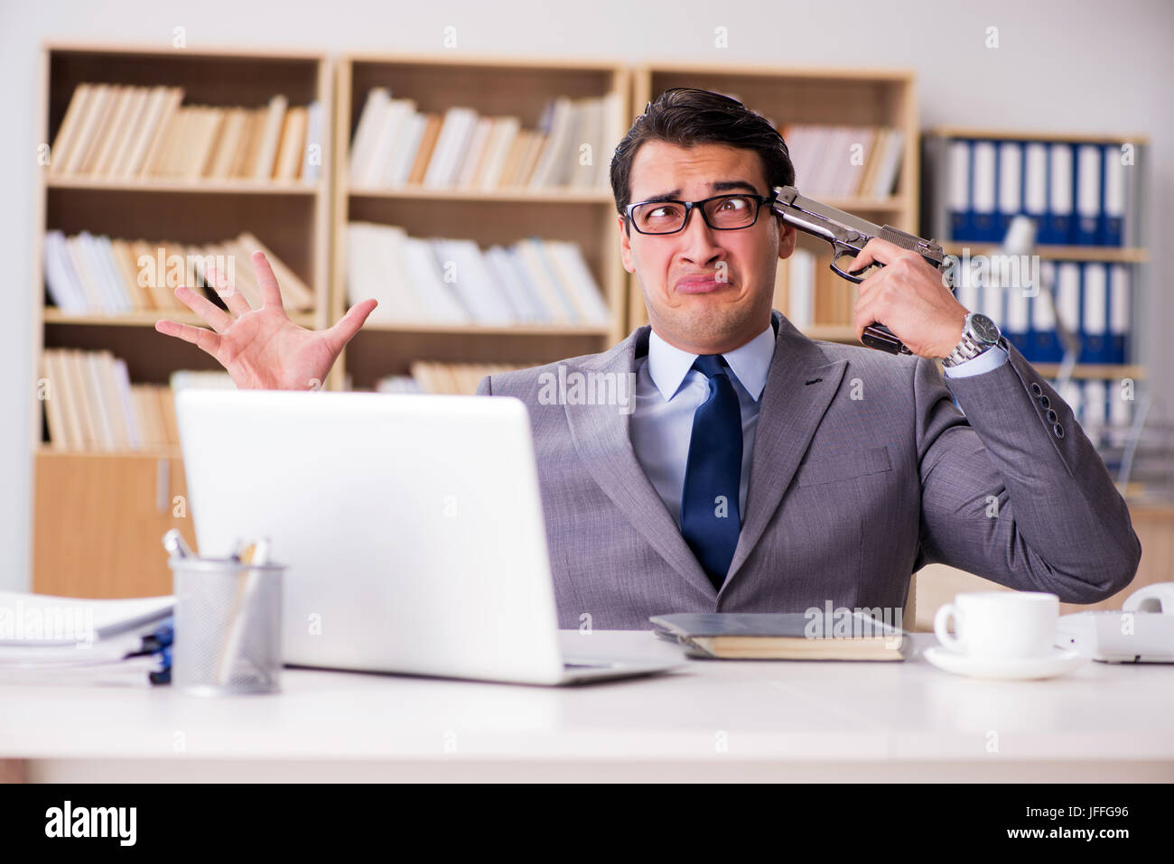 Angry businessman working in the office Stock Photo - Alamy