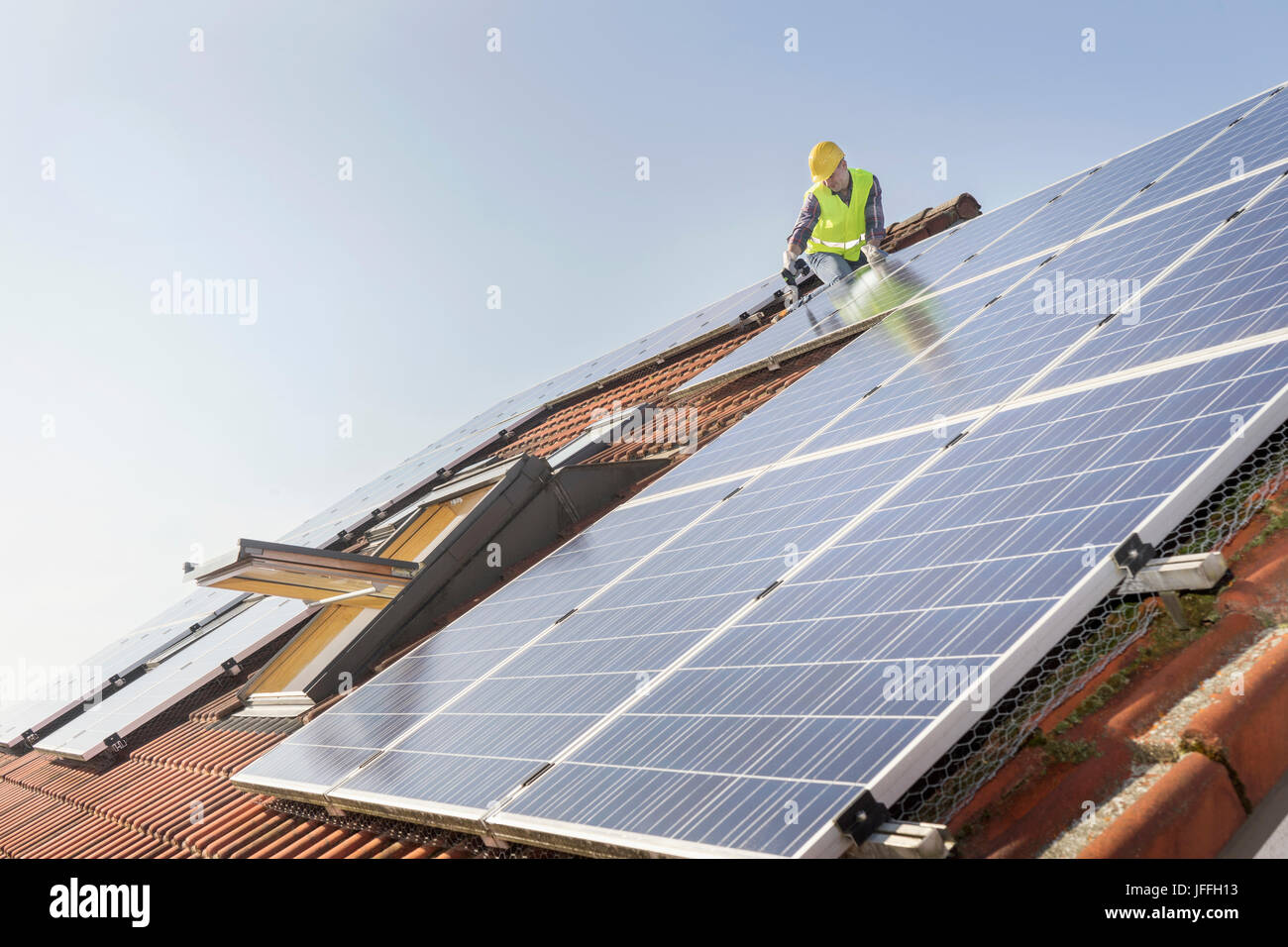 Installing solar panels hi-res stock photography and images - Alamy