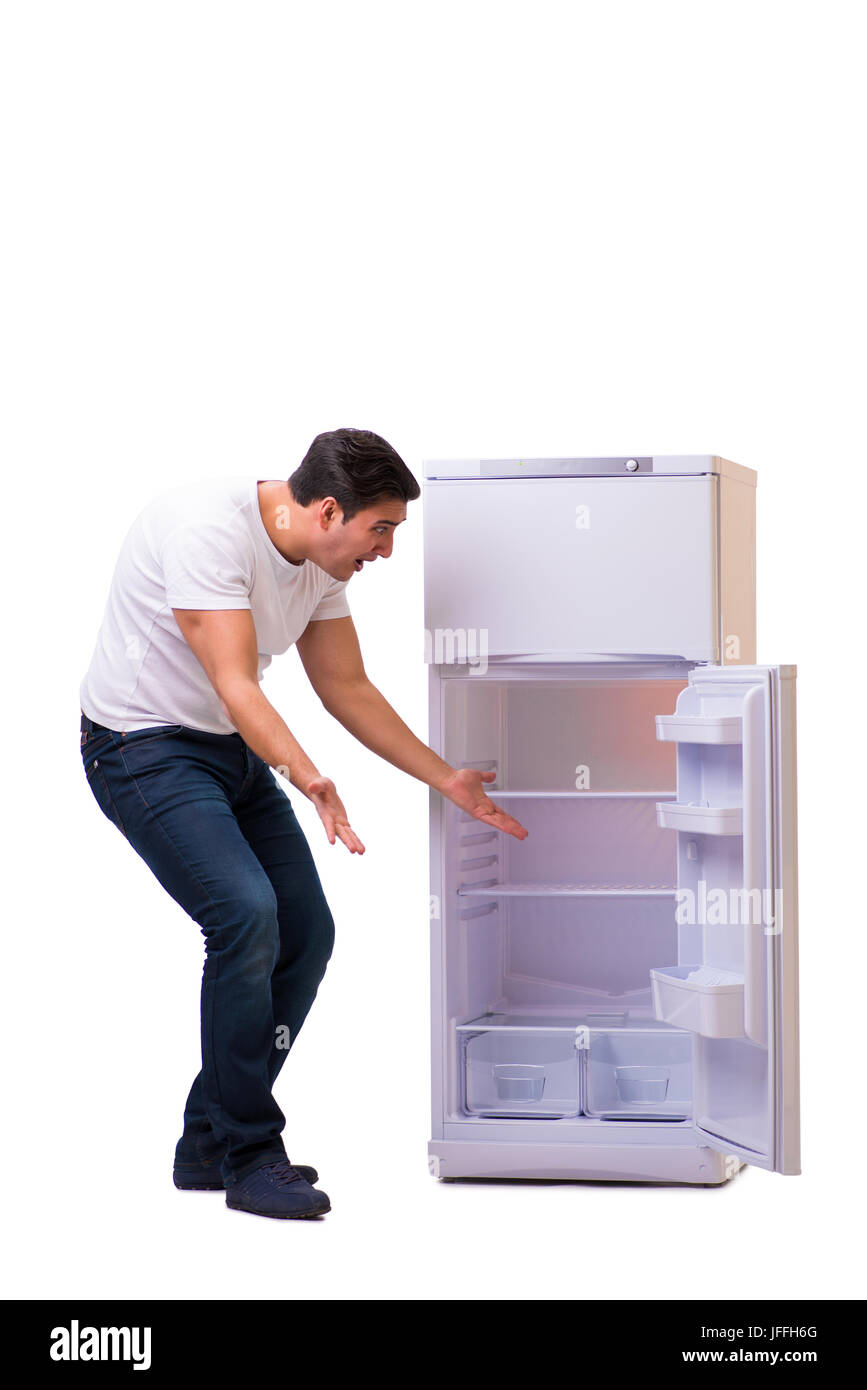 Man looking for food in empty fridge Stock Photo - Alamy