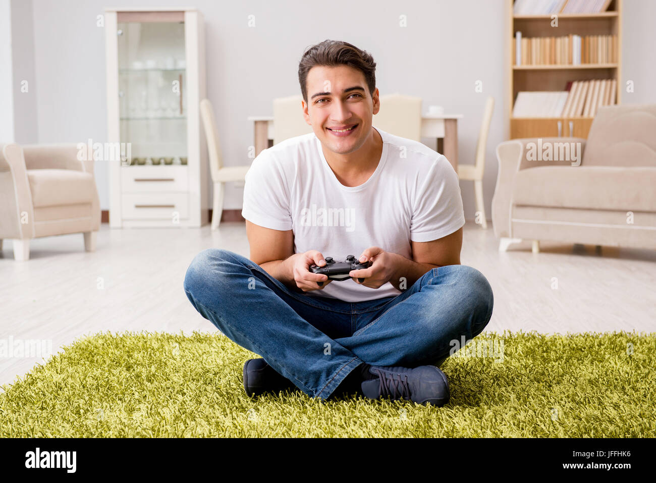 Man addicted to computer games Stock Photo - Alamy