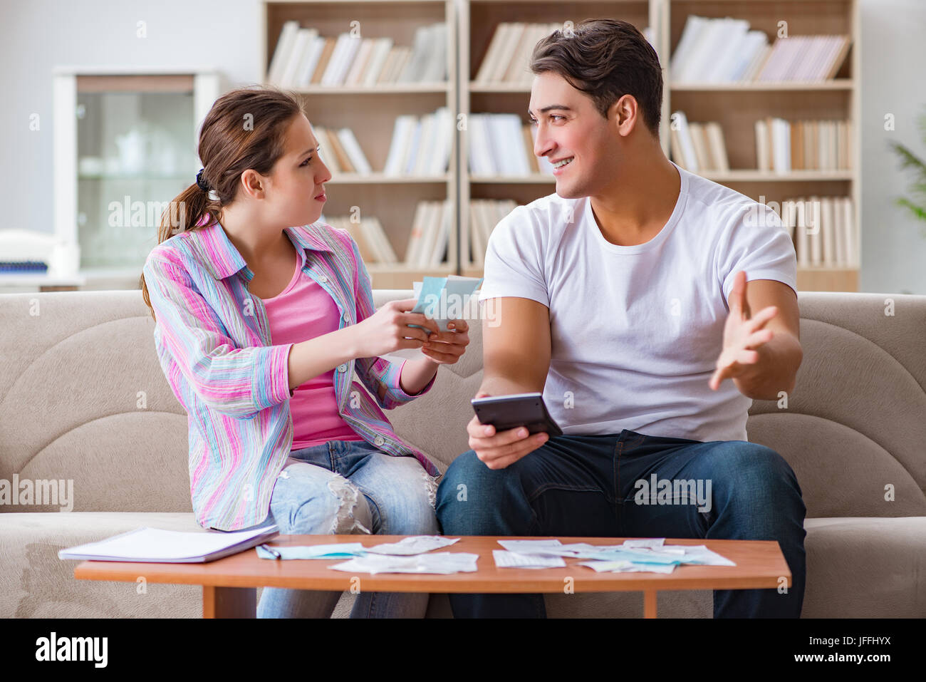 Young family discussing family finances Stock Photo - Alamy