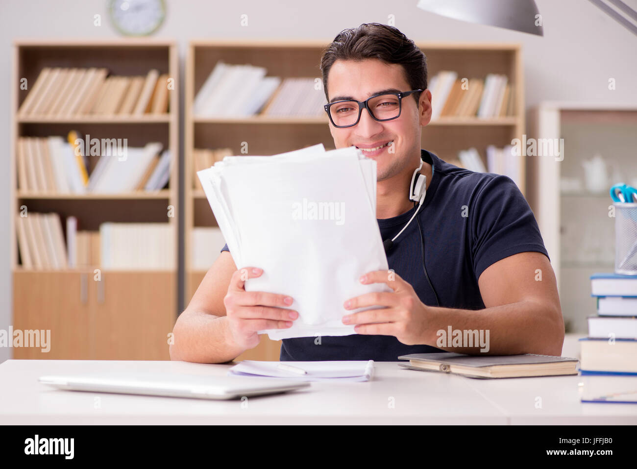 Happy male student preparing hi-res stock photography and images - Alamy