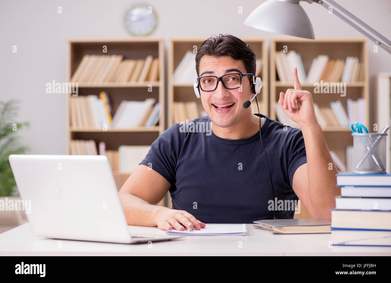 Young freelance worked working on computer Stock Photo - Alamy