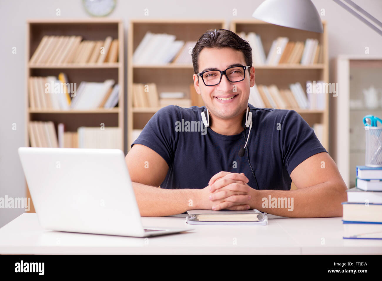 Young freelance worked working on computer Stock Photo - Alamy