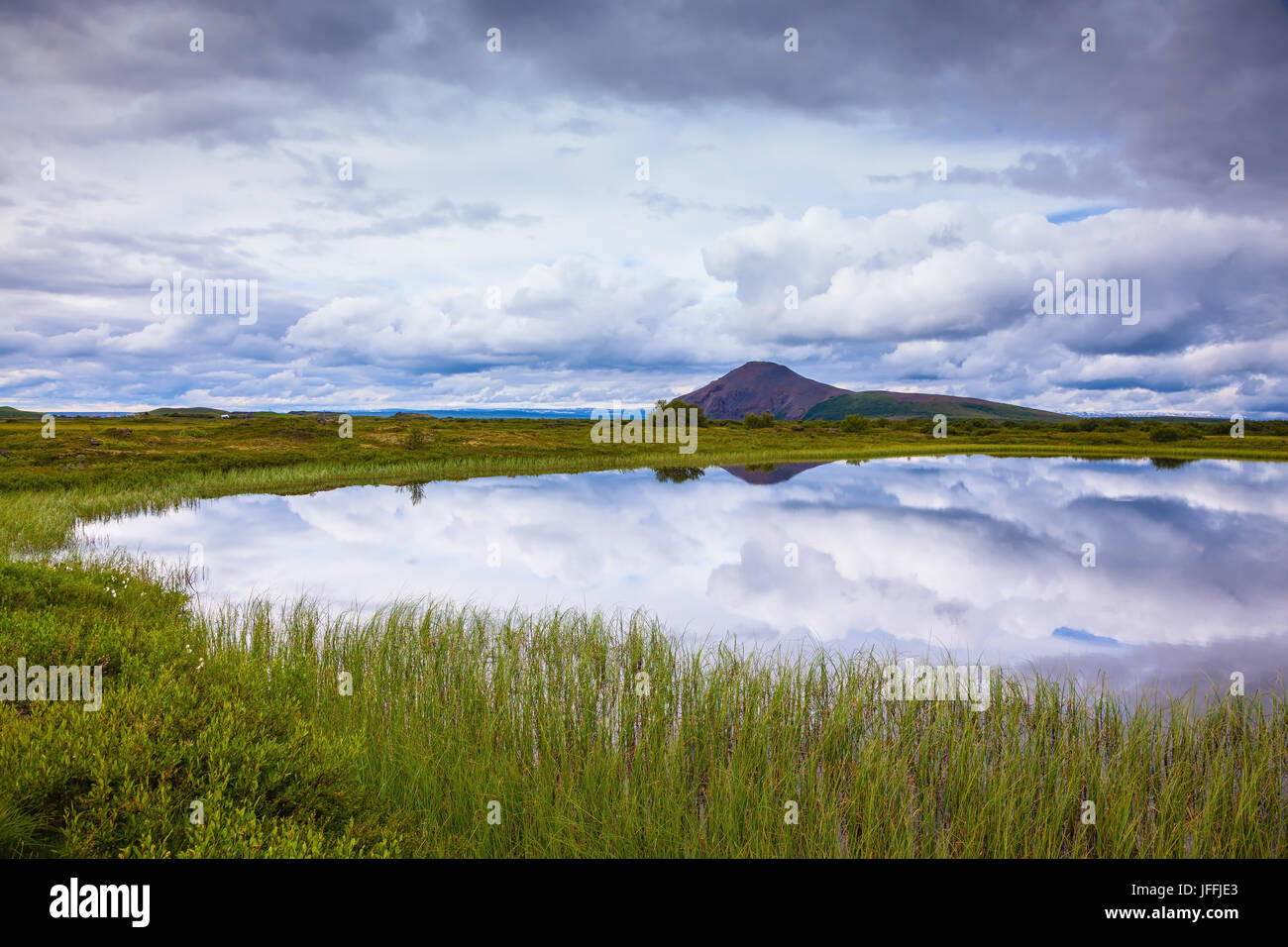 The smooth water of cold lake Stock Photo - Alamy