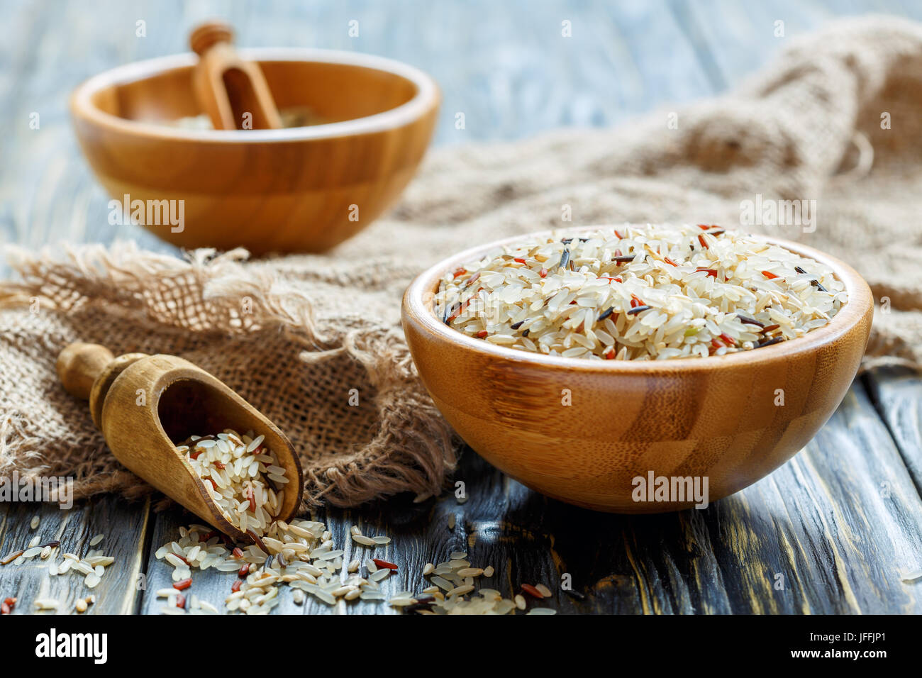 Wooden bowl with a mixture of different varieties of rice Stock Photo ...