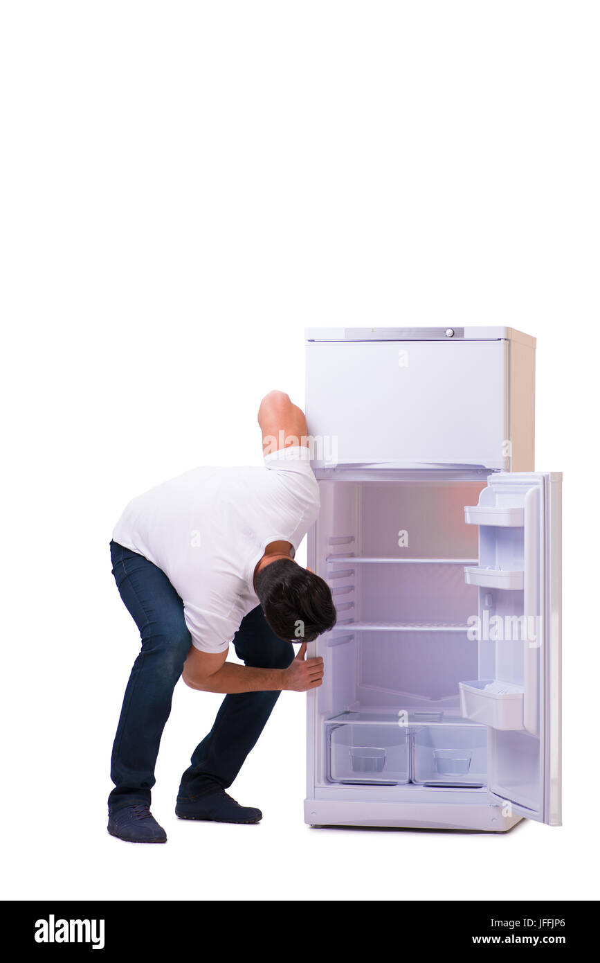 Man looking for food in empty fridge Stock Photo - Alamy