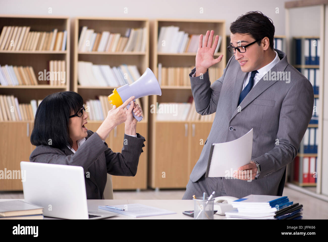 Angry boss reprimanding subordinate employee Stock Photo - Alamy