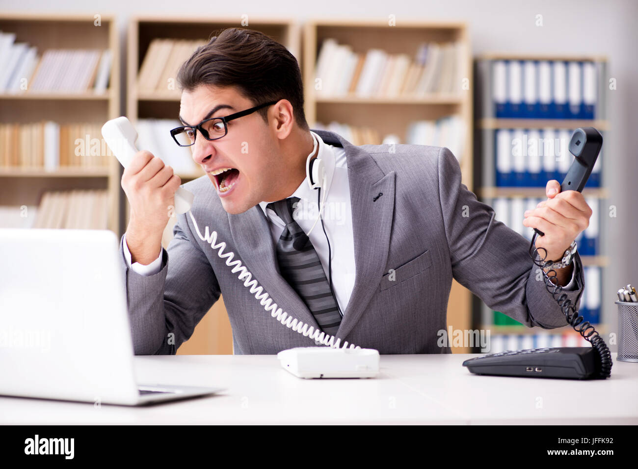 Angry helpdesk operator in hi-res stock photography and images - Alamy