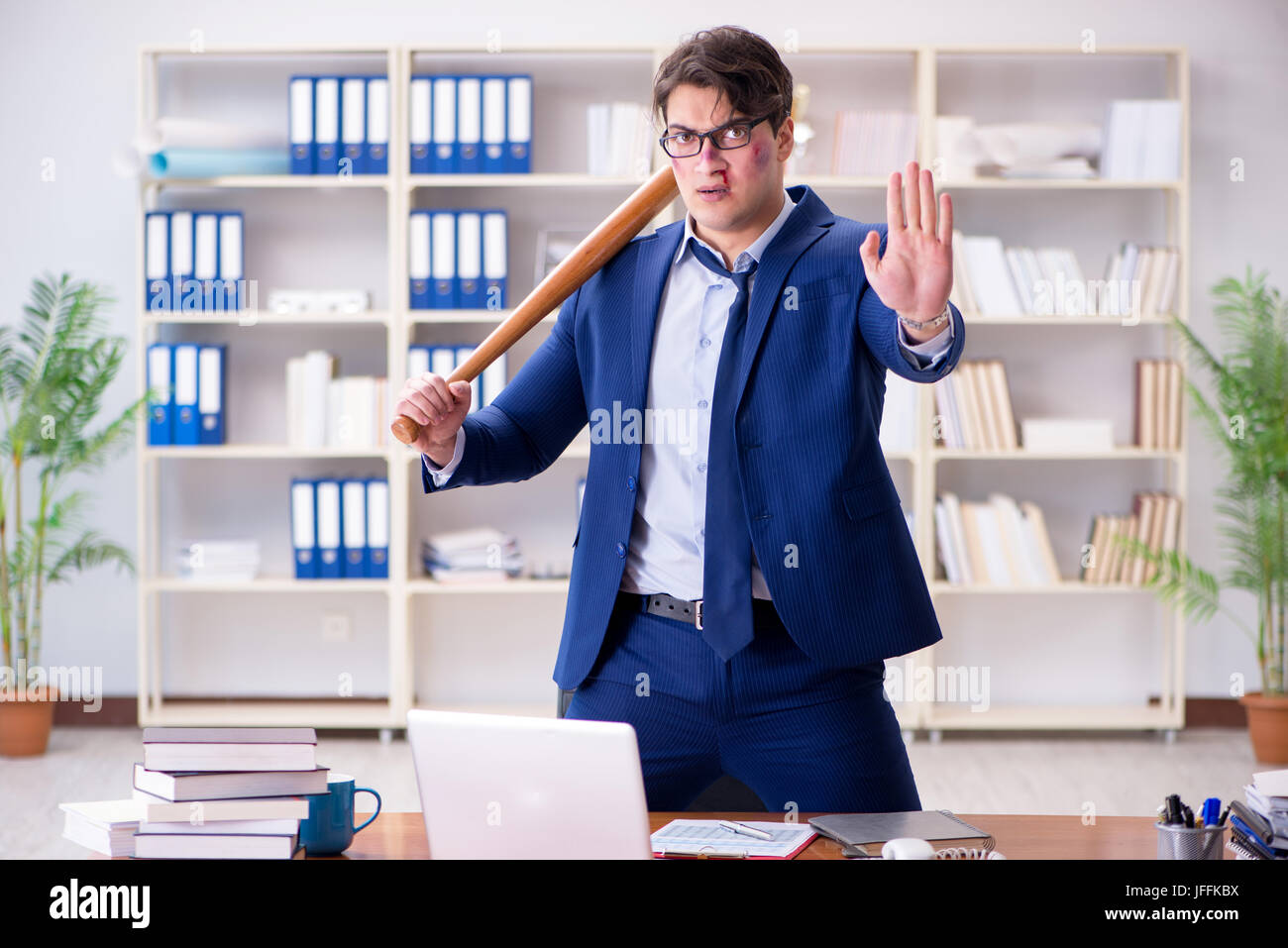 Angry aggressive businessman in the office Stock Photo - Alamy