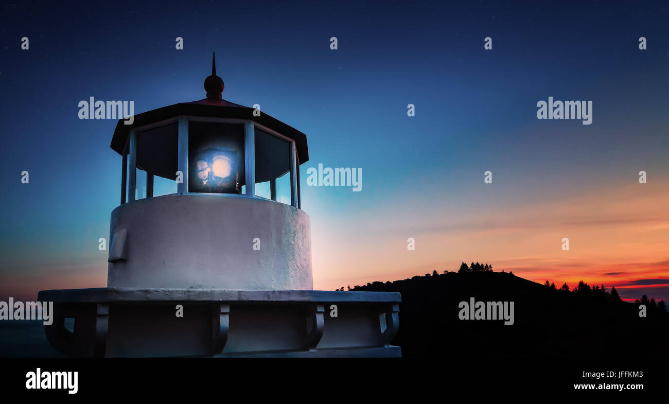 Lighthouse at Sunset Stock Photo - Alamy