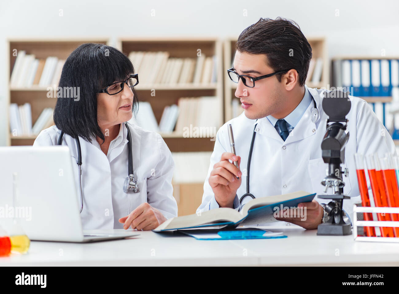 Two doctors working in the lab Stock Photo - Alamy