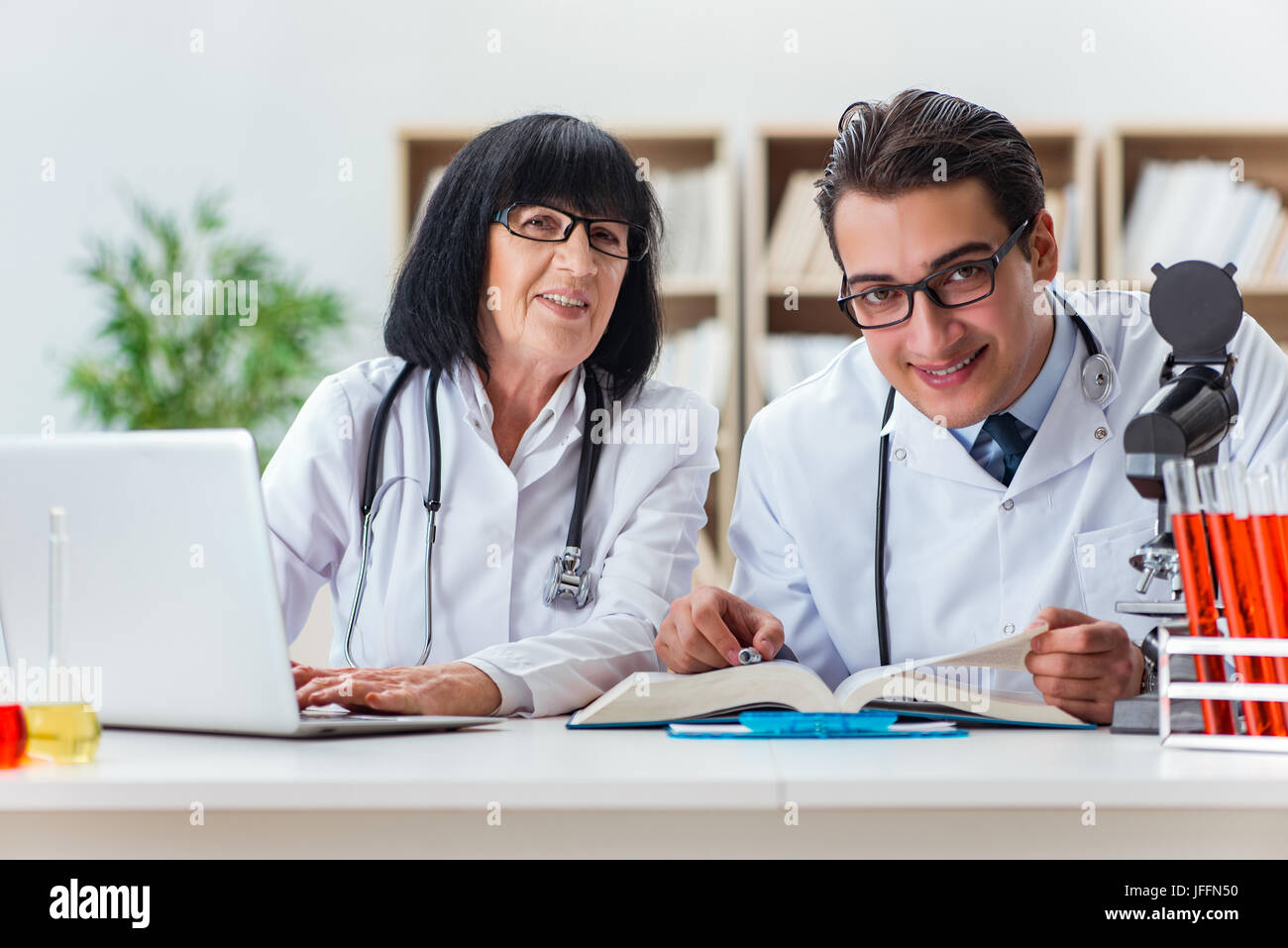 Two doctors working in the lab Stock Photo - Alamy