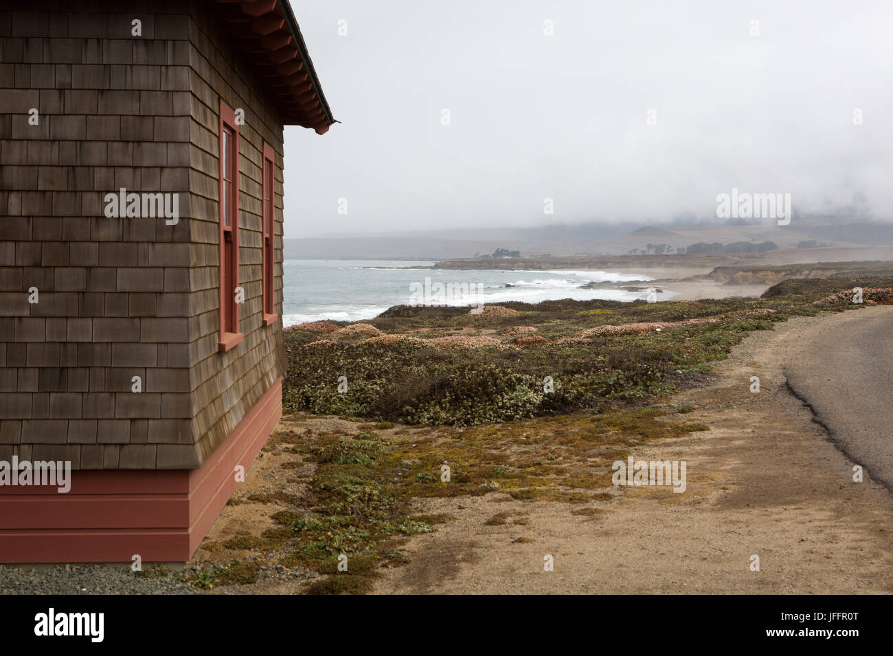 The fog signal building at the Piedras Blancas Lighthouse, under a ...