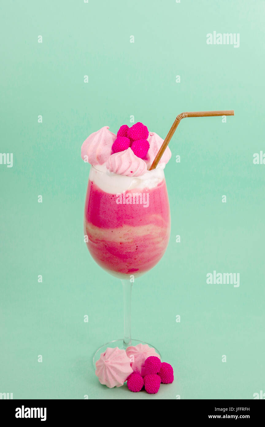 Delicious homemade extreme milkshake of strawberry with milk foam on ...