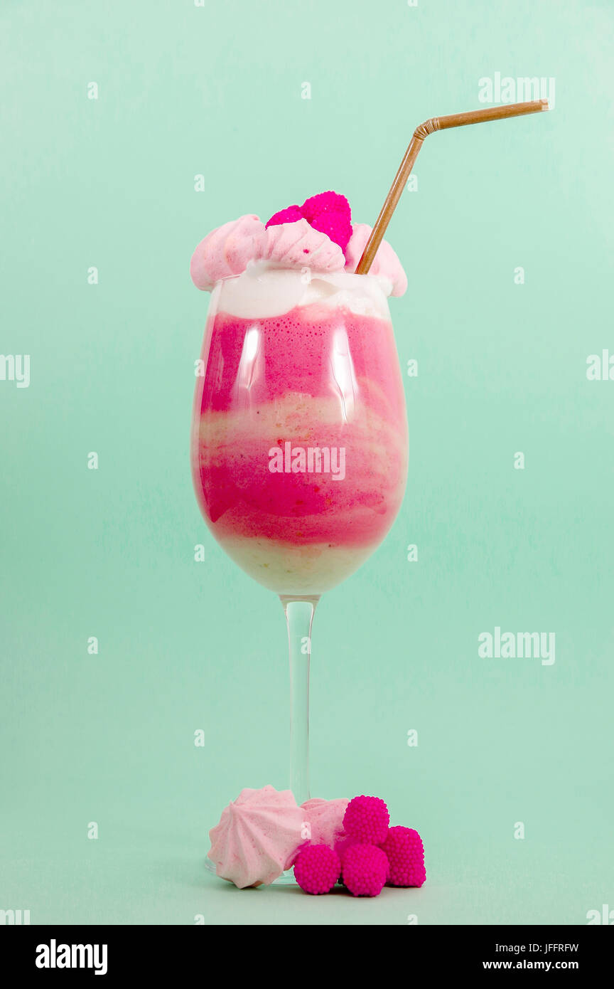 Delicious homemade extreme milkshake of strawberry with milk foam on ...