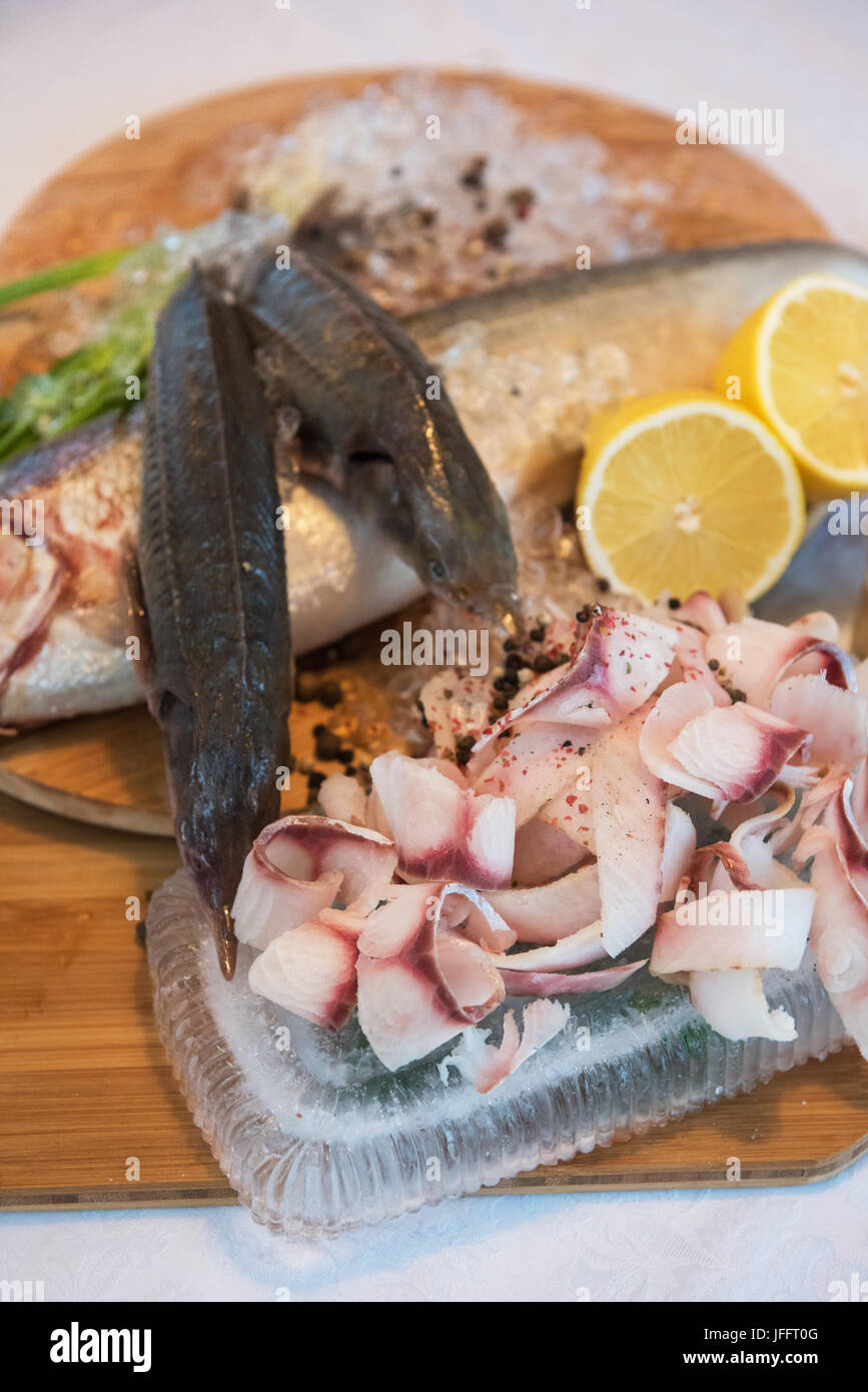 Sliced frozen raw fish from whitefish Stock Photo - Alamy