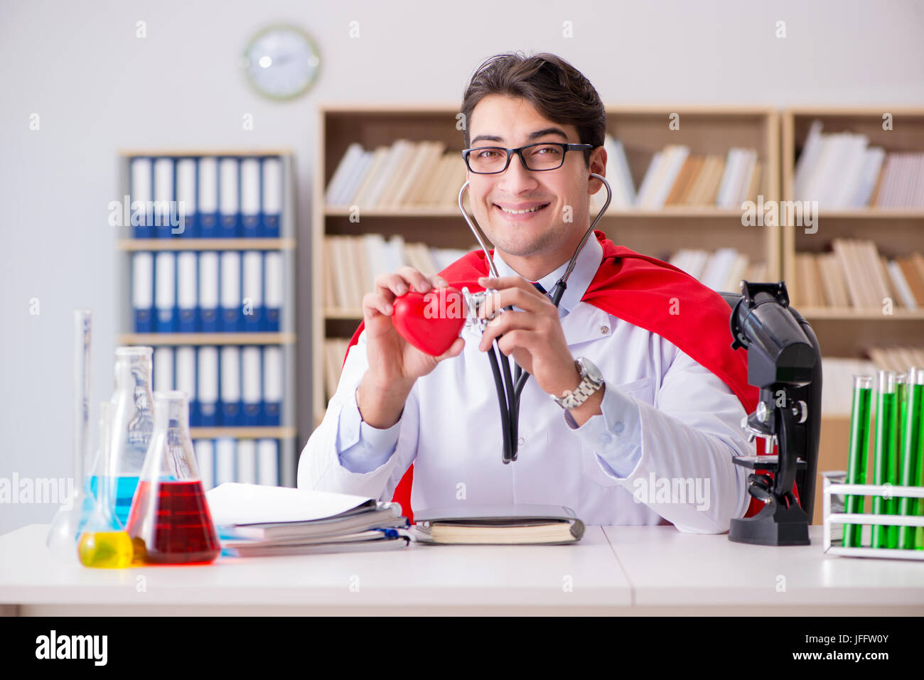 Superhero doctor working in the lab hospital Stock Photo - Alamy