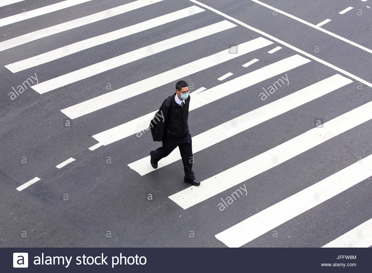 Person Wearing A Mask Stock Photos & Person Wearing A Mask Stock Images ...