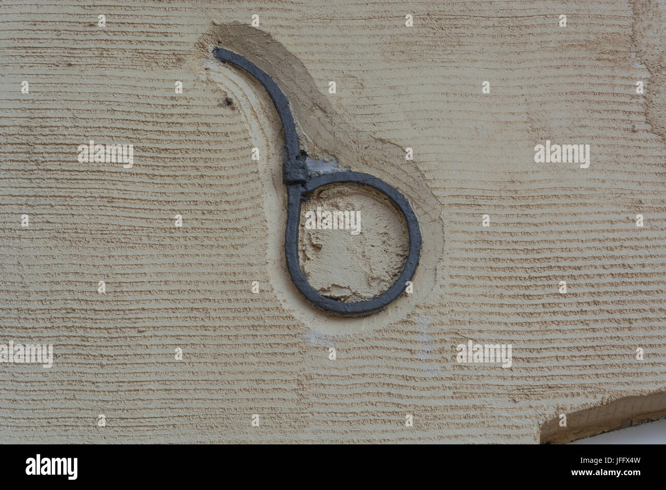 Rusty antique wall anchor Stock Photo - Alamy