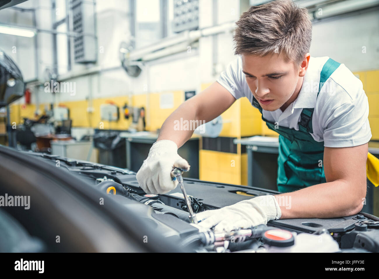 Mechanic man in gloves hi-res stock photography and images - Alamy