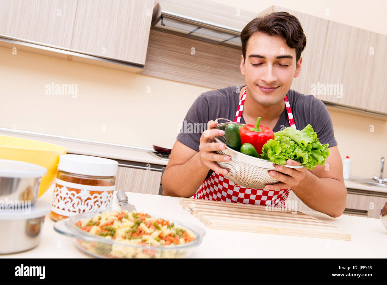 Man male cook preparing food in kitchen Stock Photo - Alamy