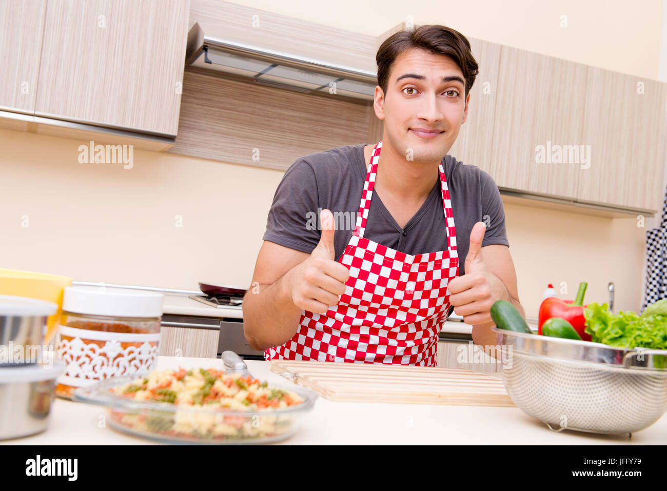 Man male cook preparing food in kitchen Stock Photo - Alamy