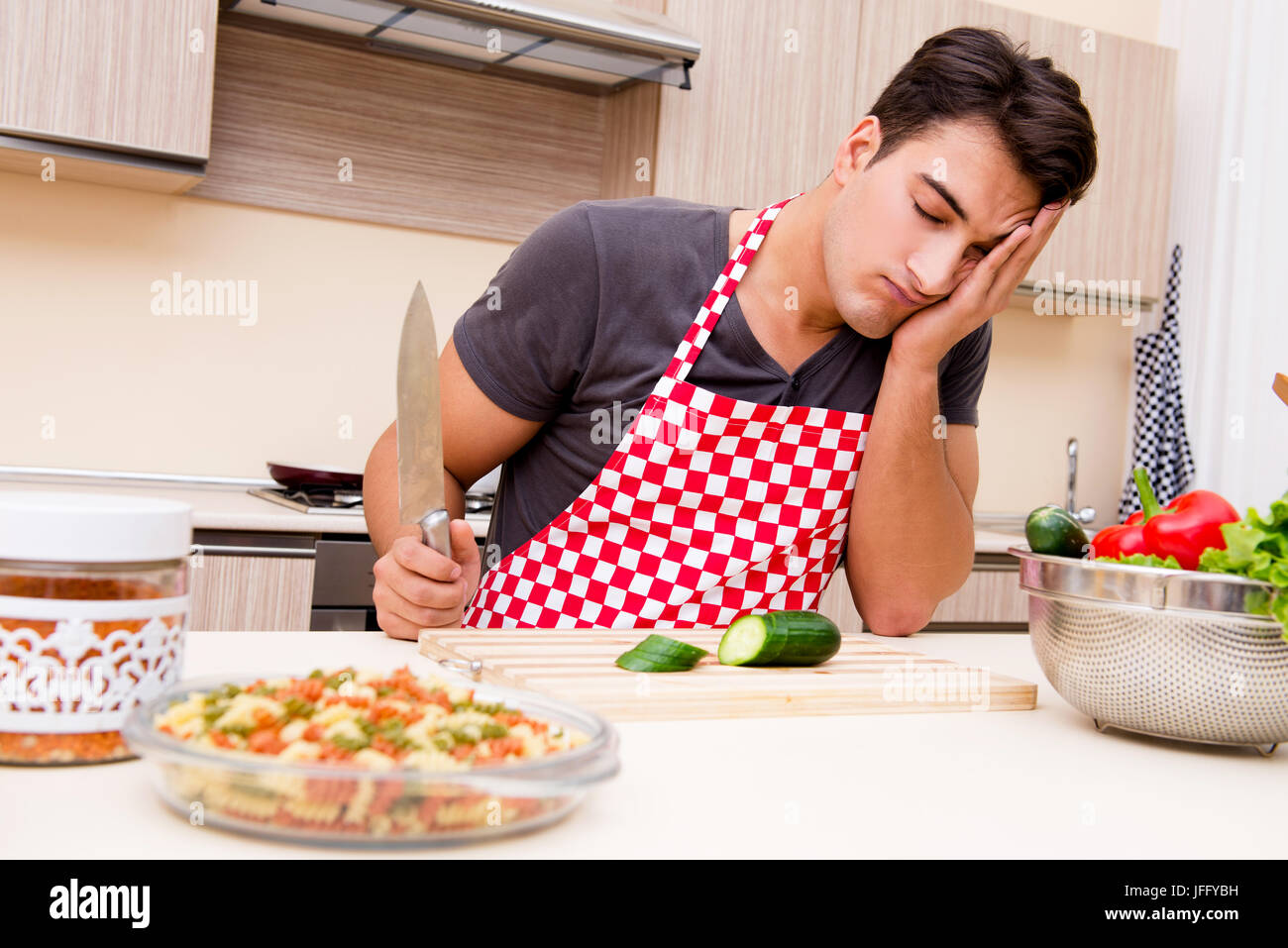 Man male cook preparing food in kitchen Stock Photo - Alamy